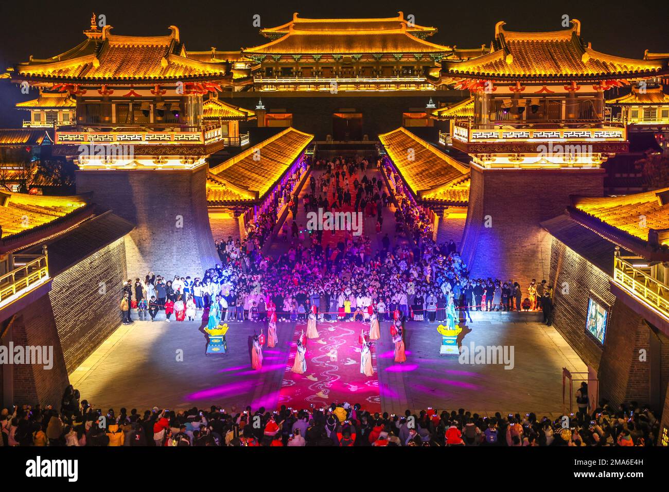 Aerial photo shows the night view of the illuminated Tangcheng scenic ...