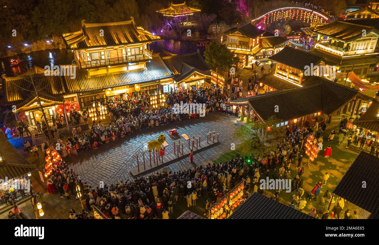 Aerial photo shows the night view of the illuminated Tangcheng scenic ...