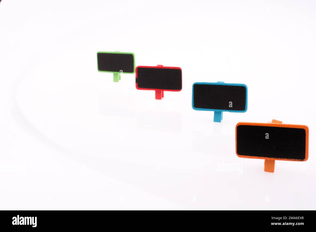 Colorful little signboards on a white background Stock Photo - Alamy