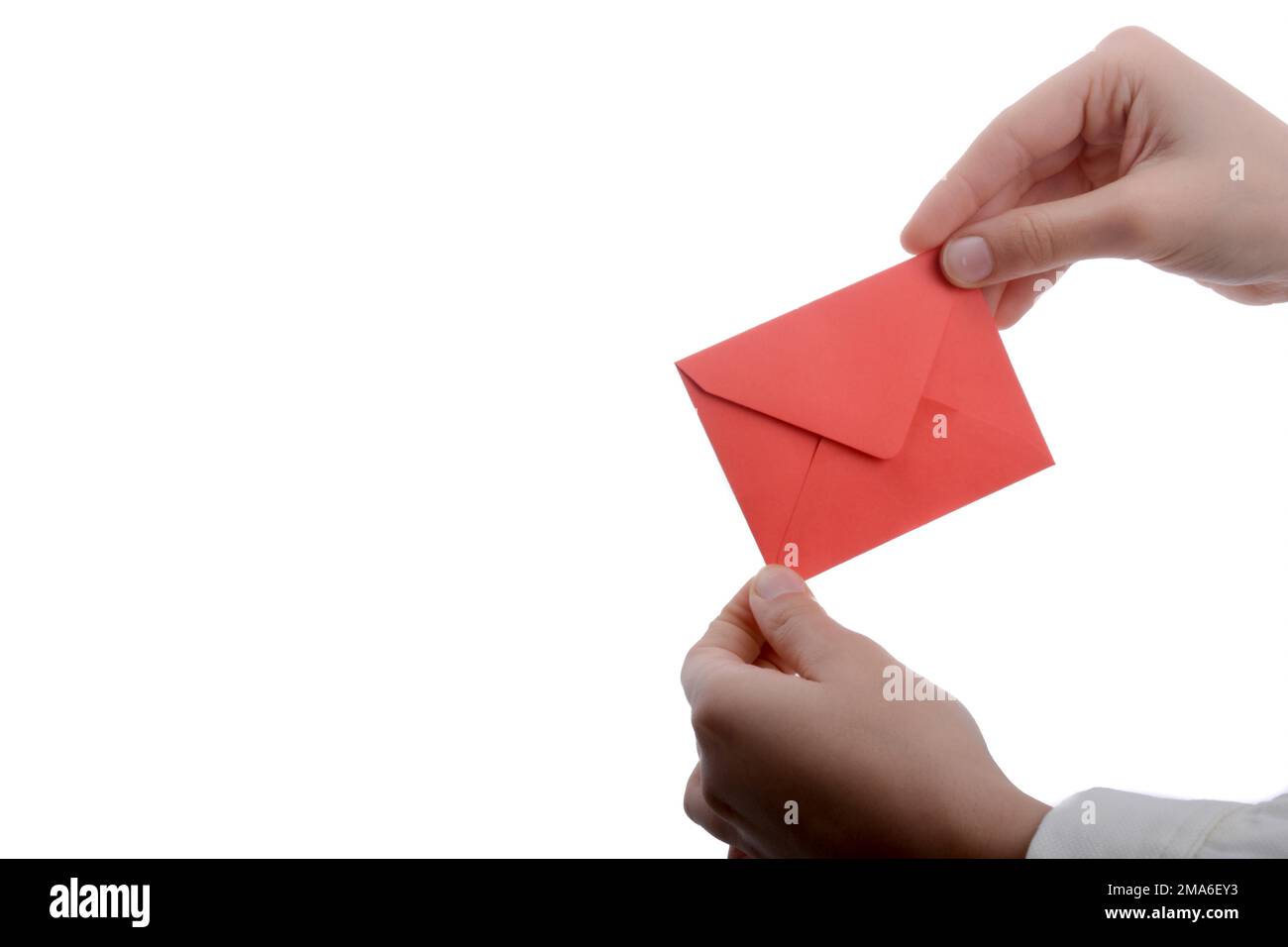 Hand holding a red envelope on a white background Stock Photo - Alamy