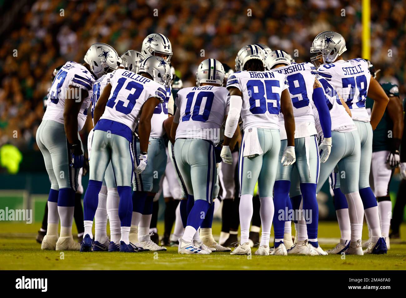 Dallas Cowboys quarterback Cooper Rush (10) huddles with his offense ...