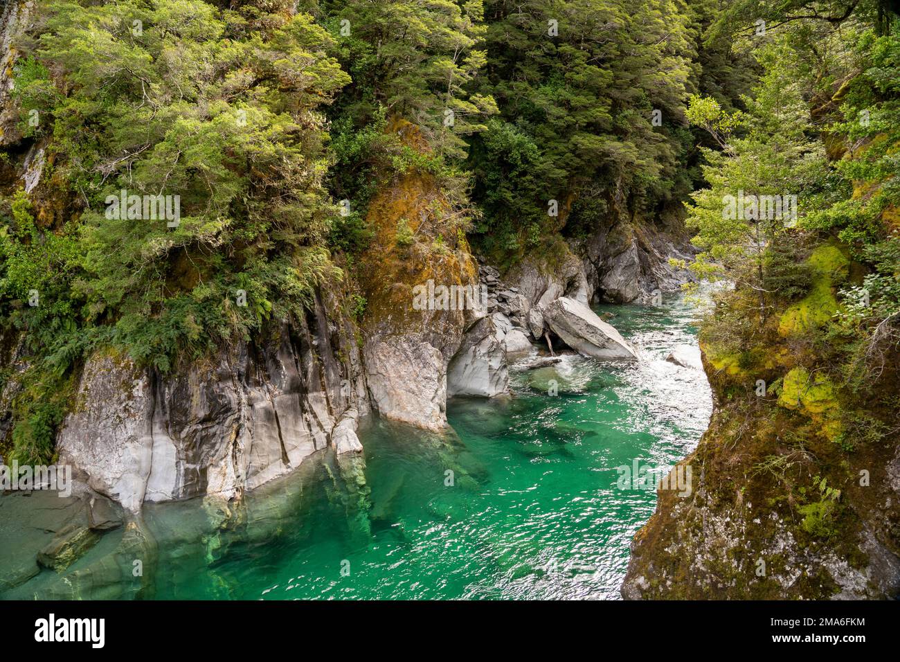 Tranquil view to the Blue Pools with deep, clear water flowing into the ...