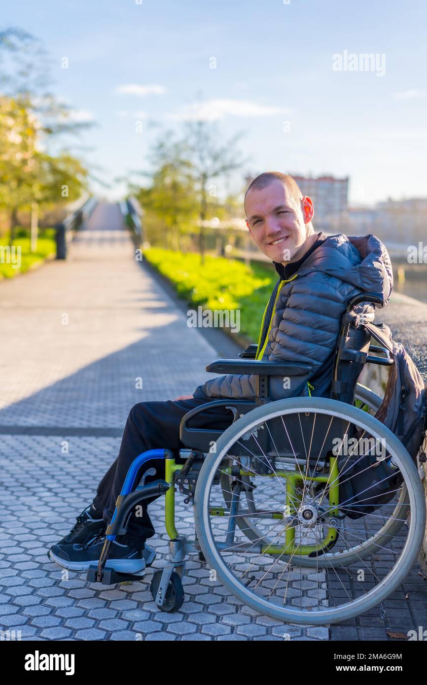 Portrait of a disabled person in a wheelchair in the city sunset Stock ...