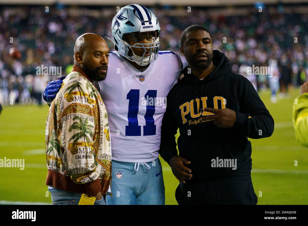 Dallas Cowboys linebacker Micah Parsons (11) poses with some fans ...
