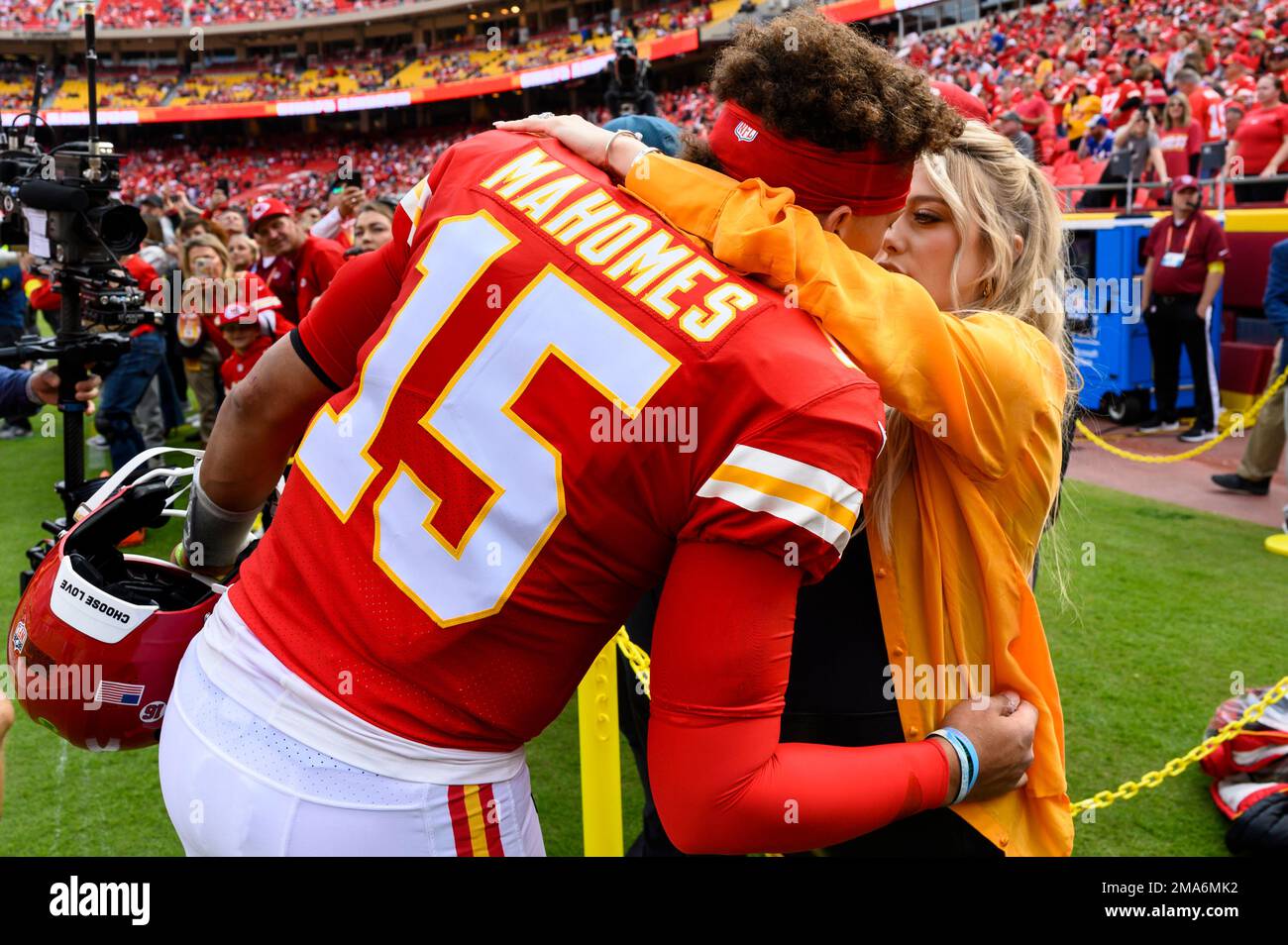 Brittany Mahomes, left, give her husband, Kansas City Chiefs ...