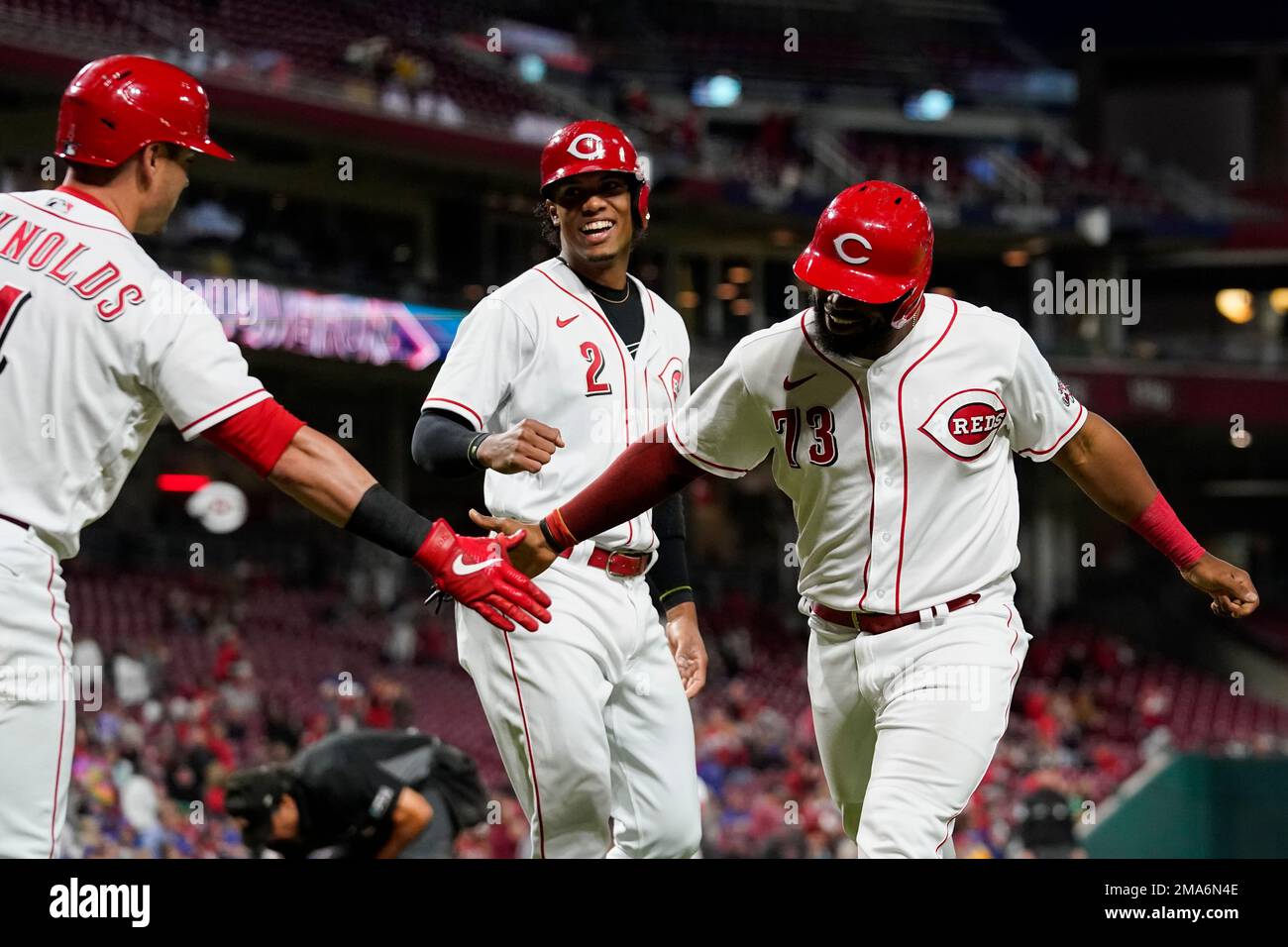 Cincinnati Reds' Chuckie Robinson (73) celebrates with Matt Reynolds ...