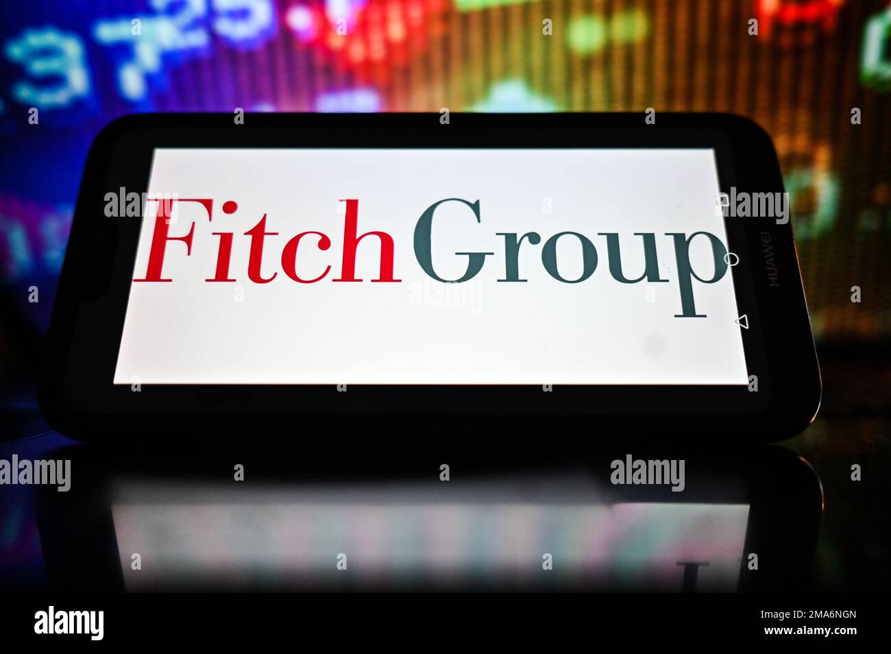 In this photo illustration a Fitch Group logo is displayed on a ...