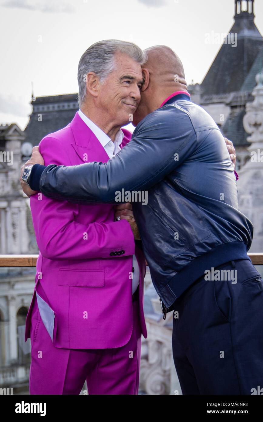 Pierce Brosnan, left, and Dwayne Johnson a.k.a. The Rock pose for ...