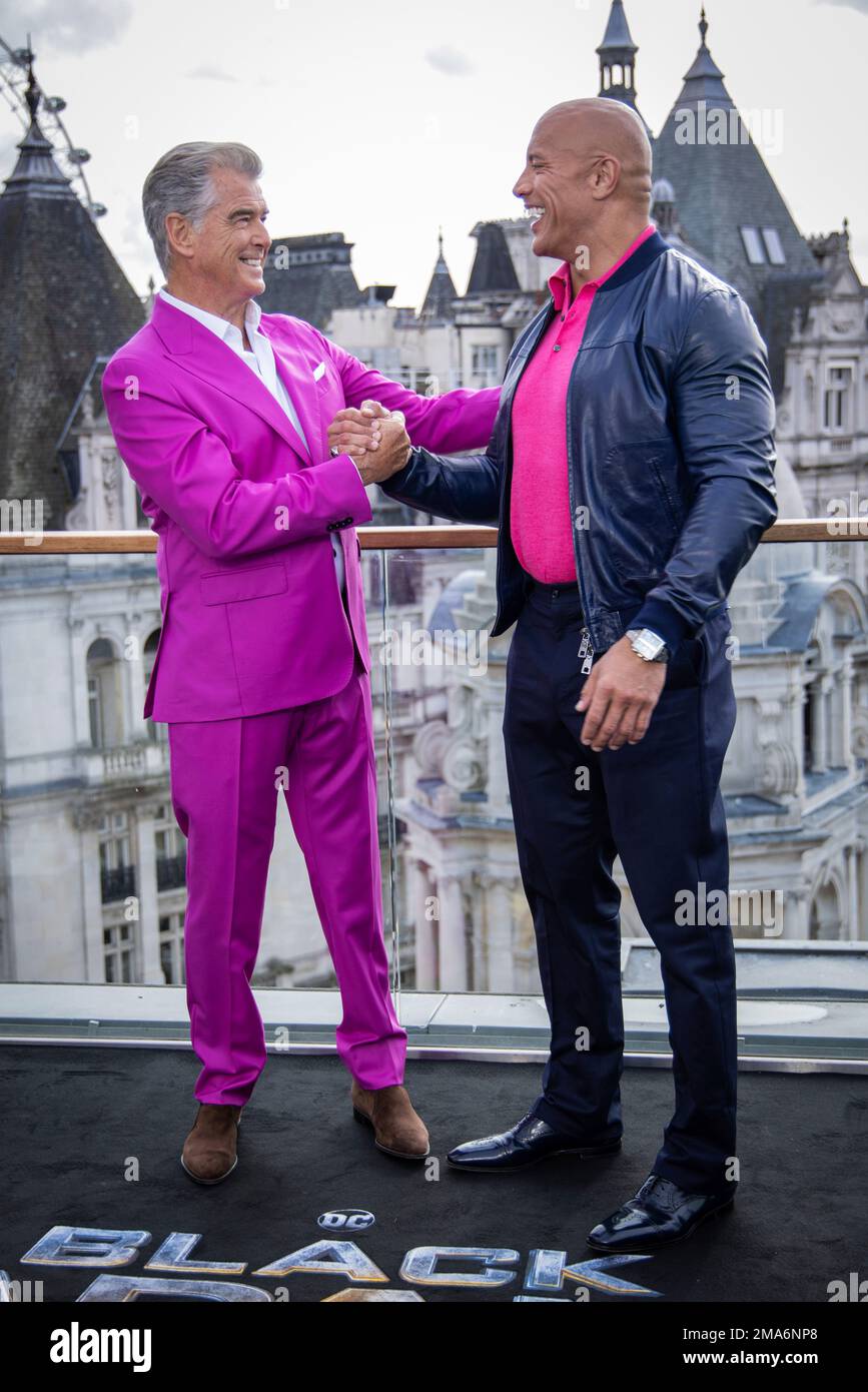 Pierce Brosnan, left, and Dwayne Johnson a.k.a. The Rock pose for ...