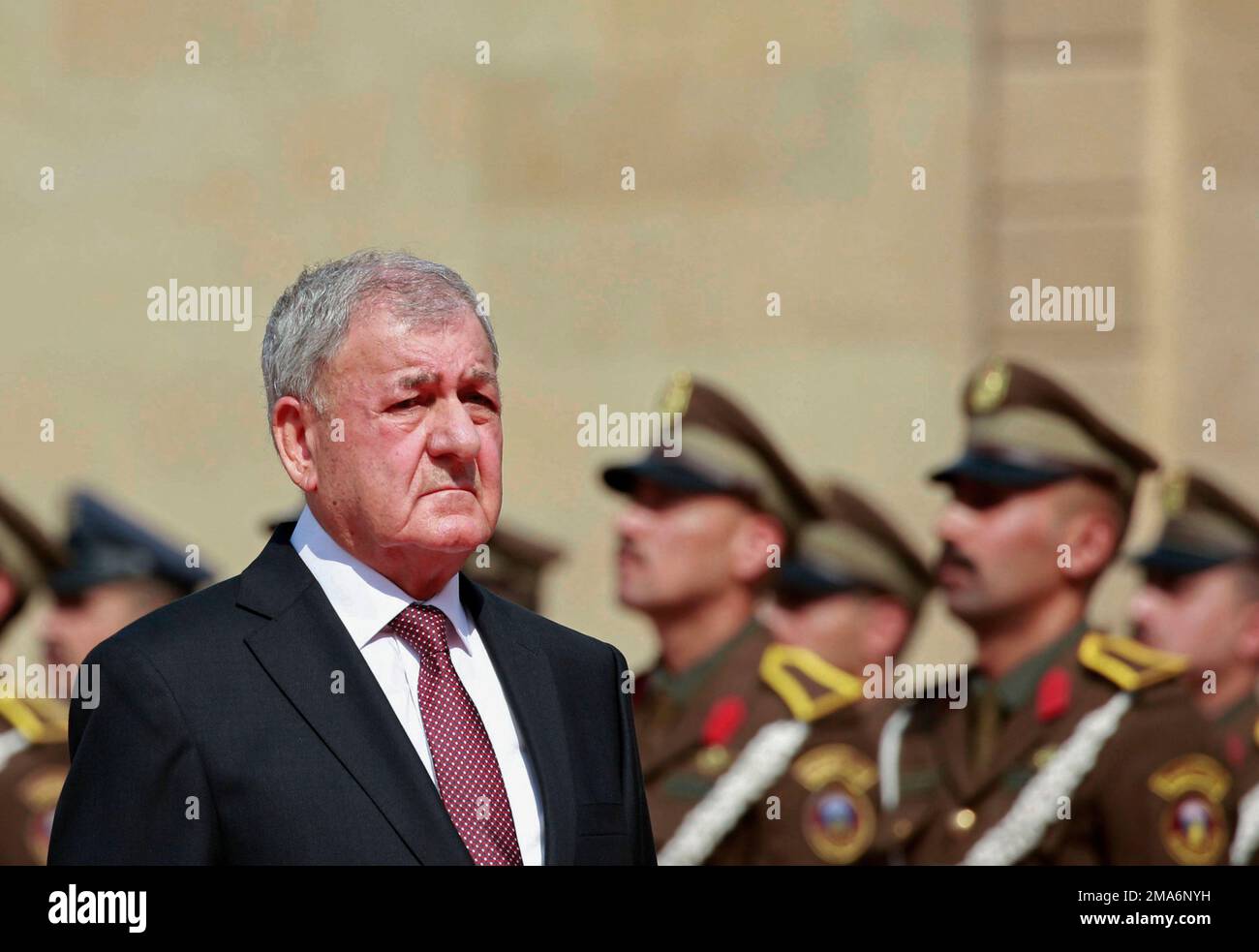 Newly elected Iraqi President Abdul Latif Rashid inspects an honor ...