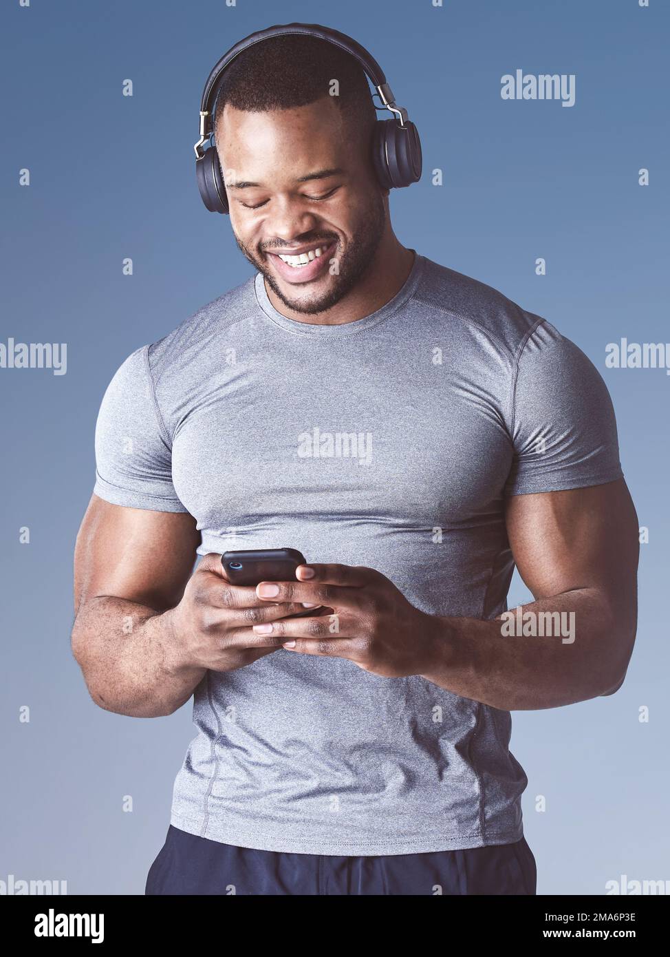 Im turning fat into muscle daily. a handsome young man standing in the ...