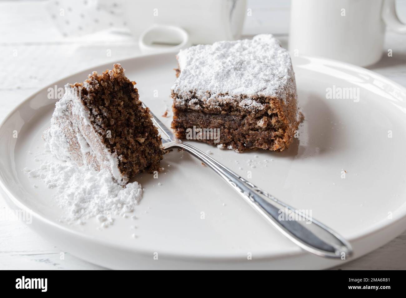 Italian chocolate, almond cake, torta caprese served sliced on a white ...