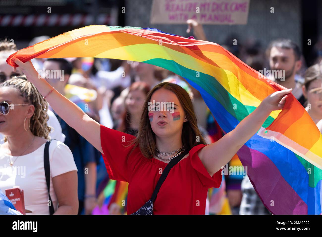 Woman with rainbow flag at the CSD parade, Cologne, North Rhine ...