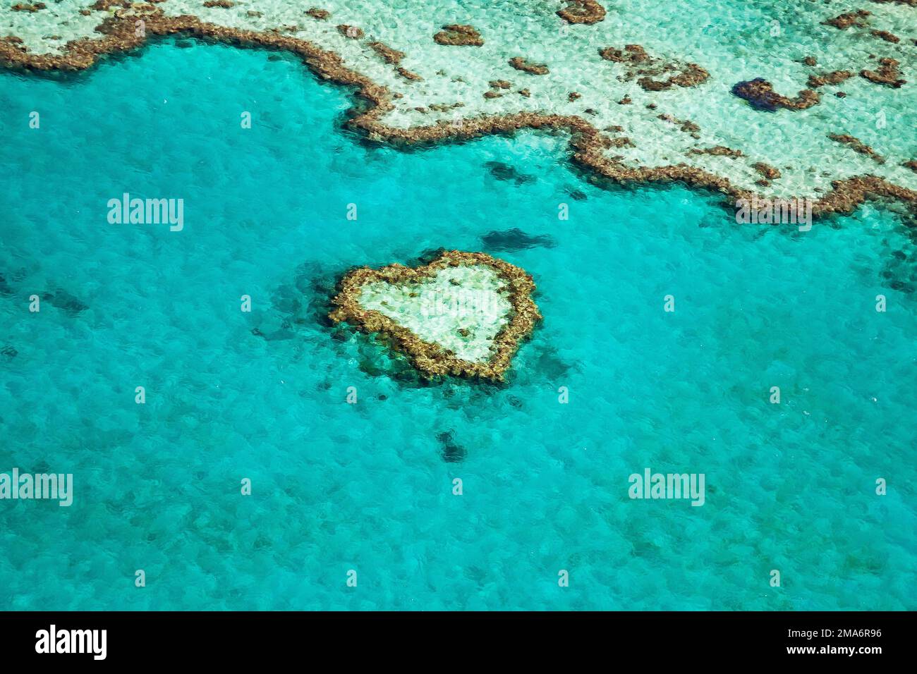 Aerial view, reefs and atolls of the Great Barrier Reef, Heart Reef ...