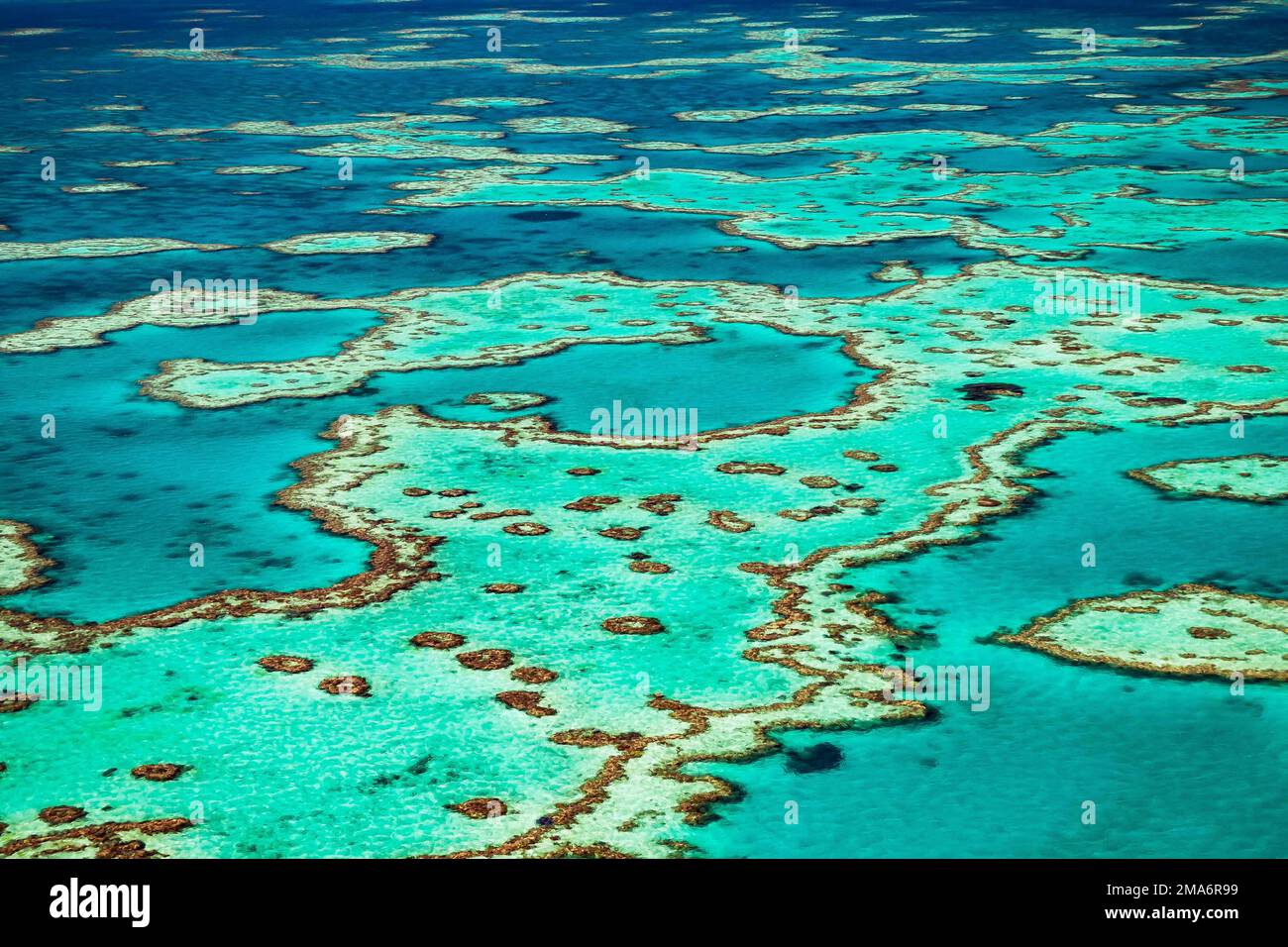 Aerial view, reefs and atolls of the Great Barrier Reef, Queensland ...