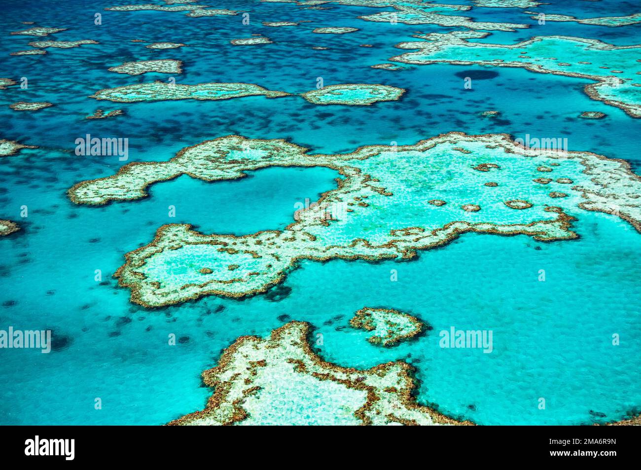 Aerial view, reefs and atolls of the Great Barrier Reef, Queensland ...