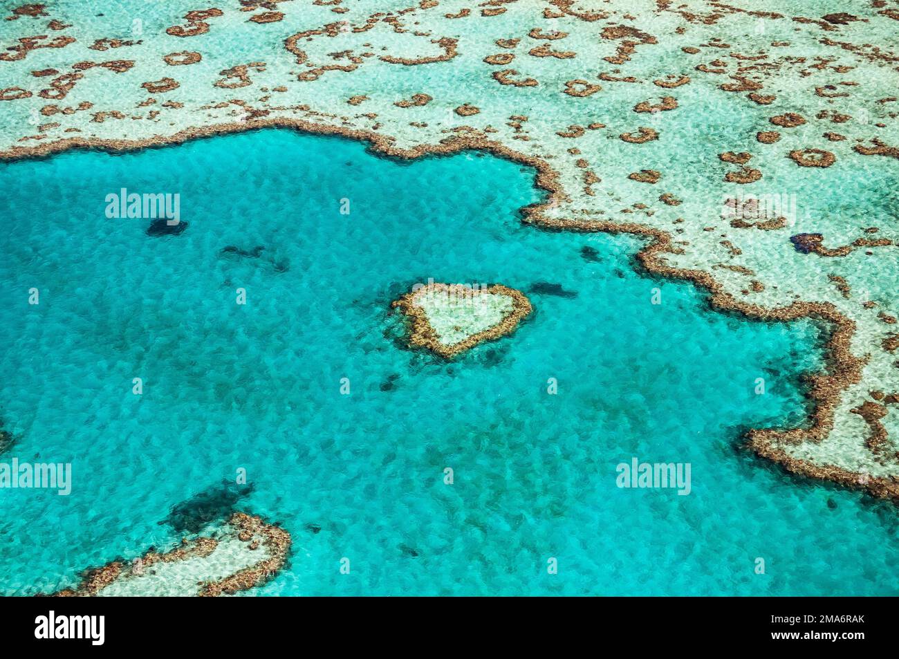 Aerial view, reefs and atolls of the Great Barrier Reef, Heart Reef ...