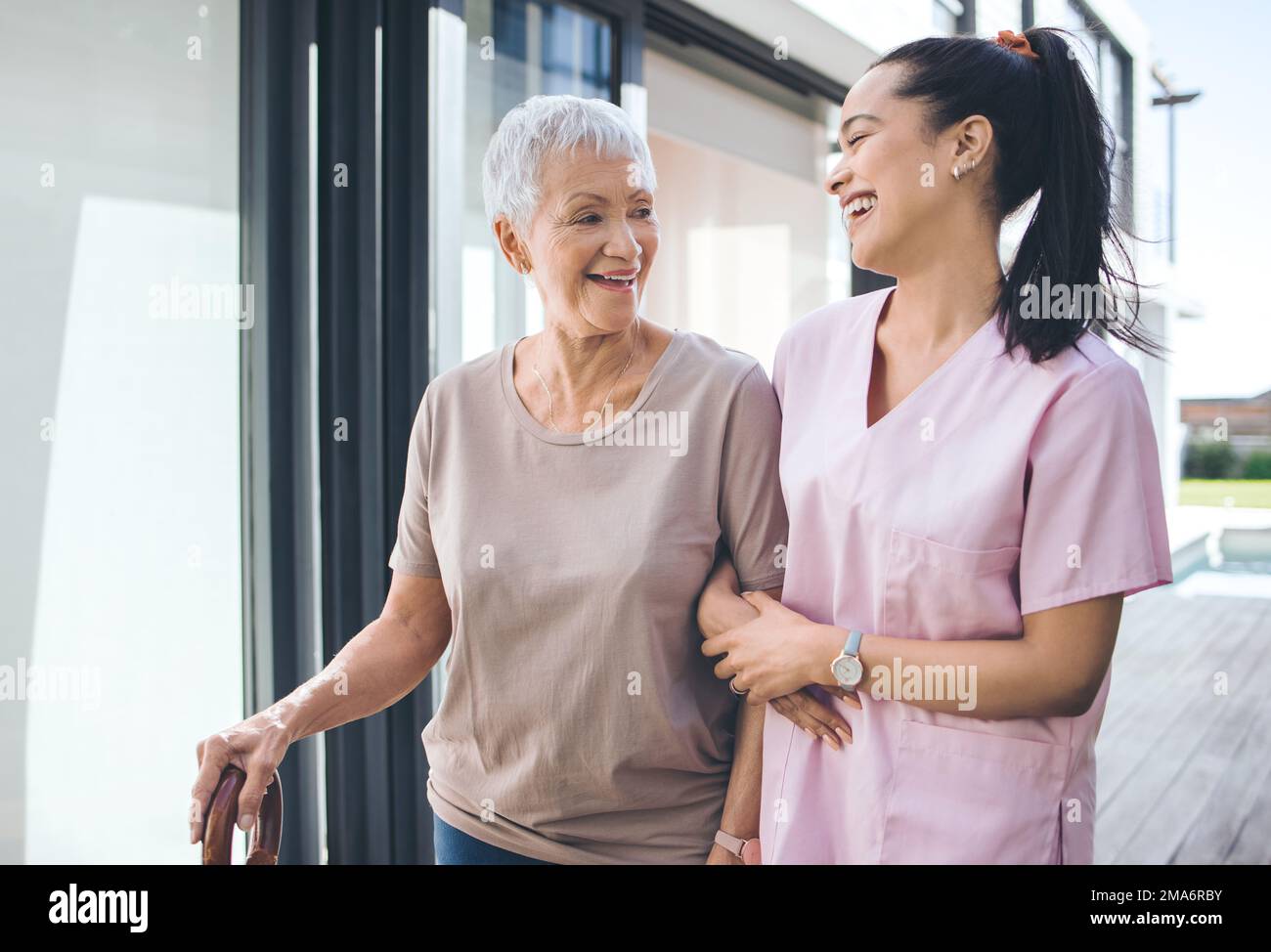Older woman with walking stick hi-res stock photography and images - Alamy