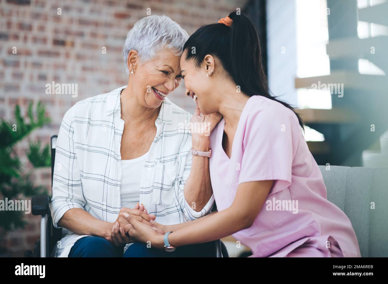 I need her more than she needs me. a young nurse caring for an older ...