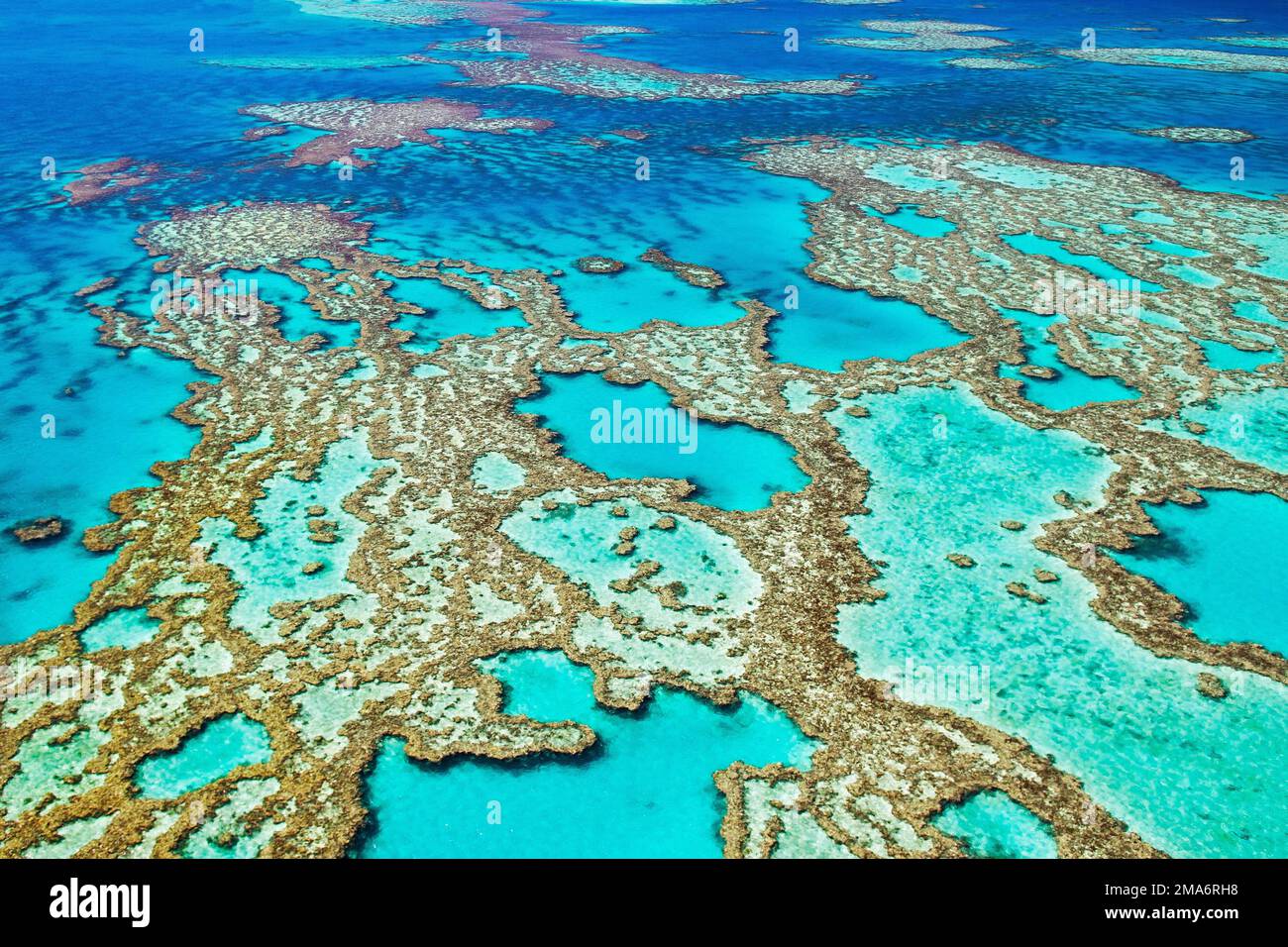 Aerial view, reefs and atolls of the Great Barrier Reef, Queensland ...