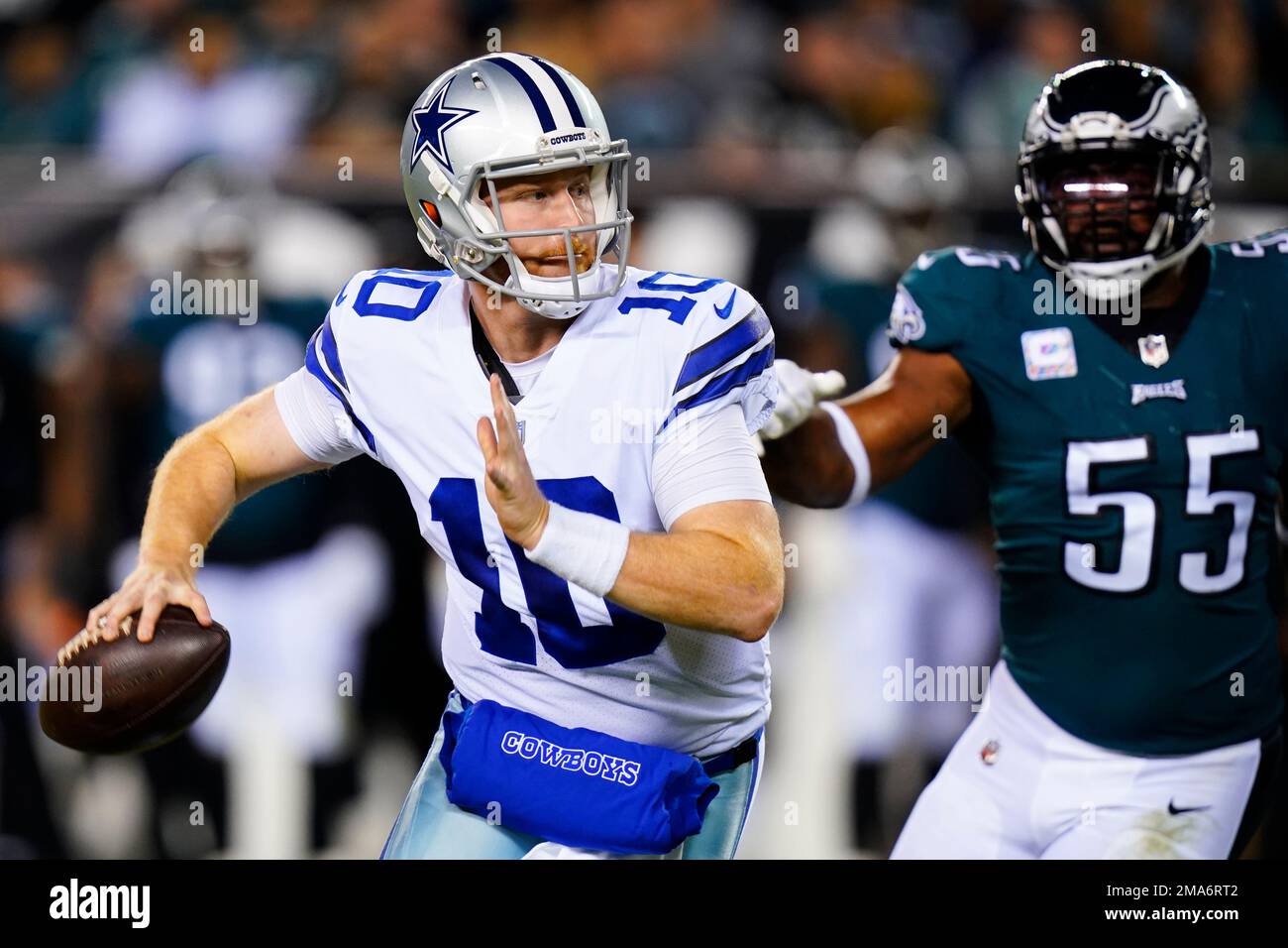 Dallas Cowboys' Cooper Rush looks to pass during the second half of an ...