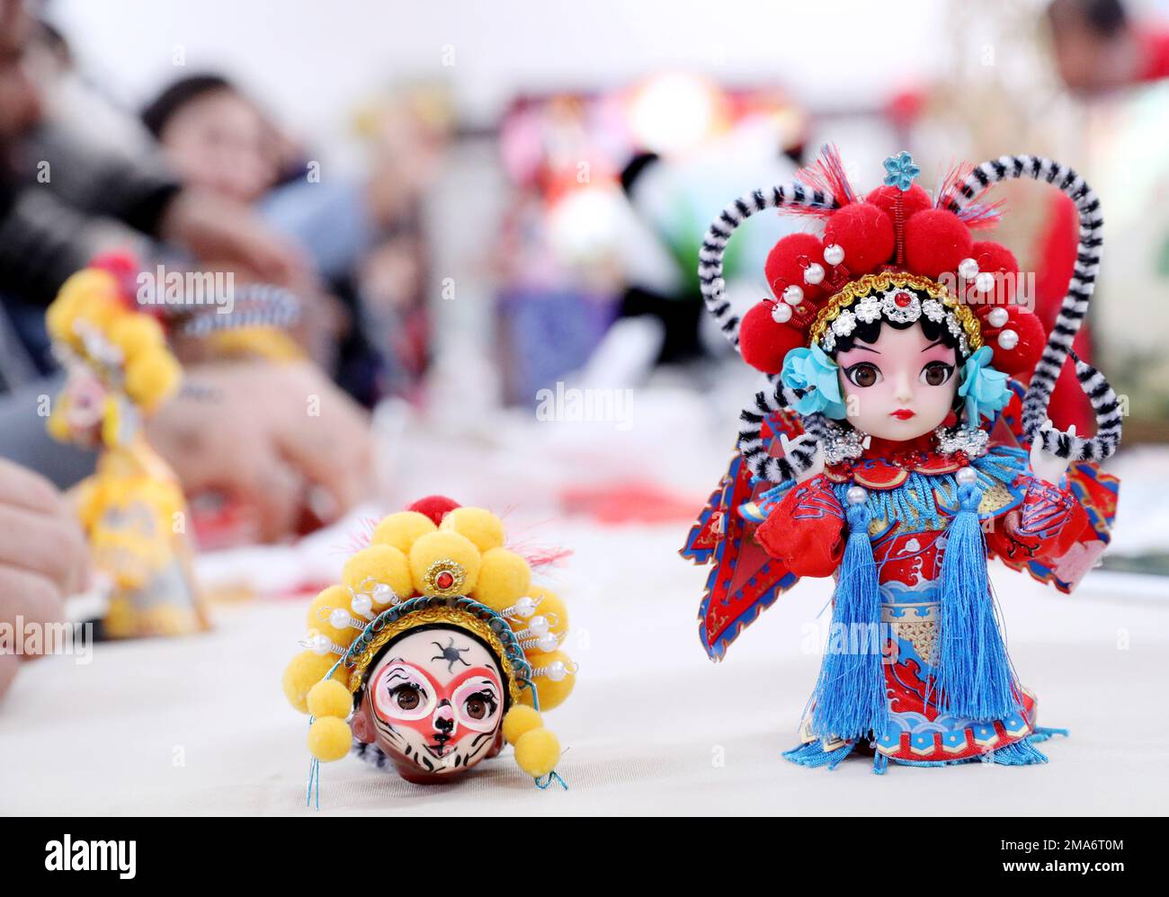 QINGDAO, CHINA - JANUARY 19, 2023 - Foreign students make silk crafts ...