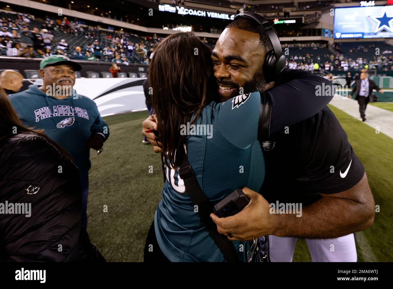 Philadelphia Eagles defensive end Brandon Graham (55) hugs a fan before ...