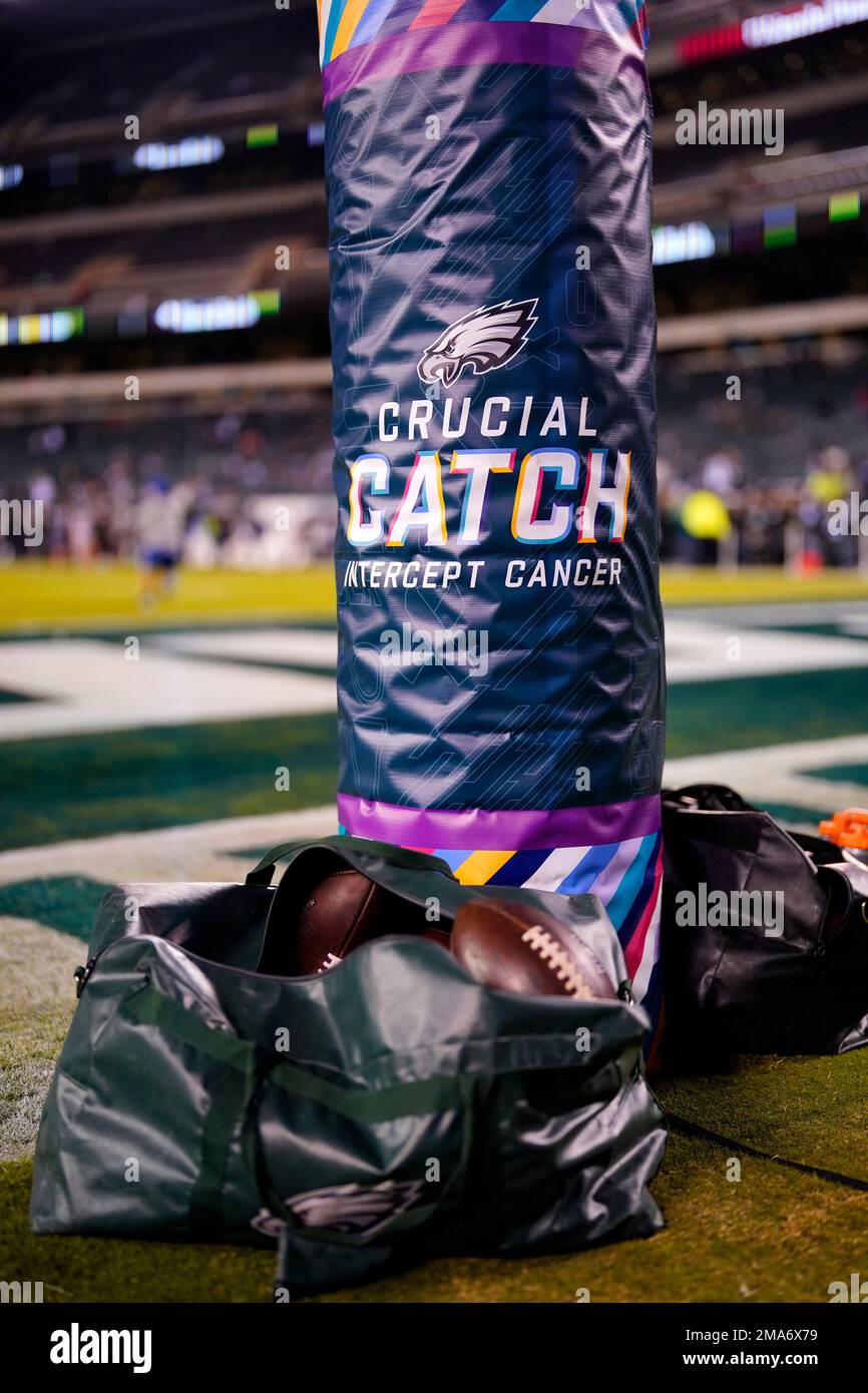 A Philadelphia Eagles logo appears above Crucial Catch signage before ...