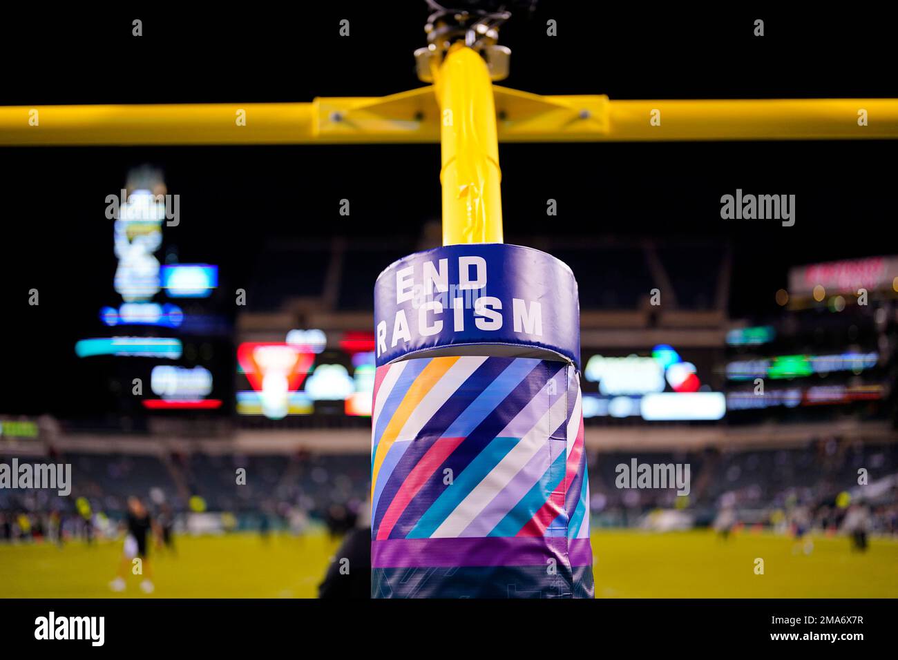 End Racism is displayed on a goal post before an NFL football game ...