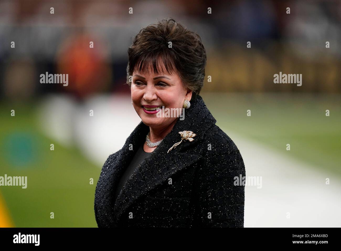 New Orleans Saints owner Gayle Benson smiles on the sideline before an ...