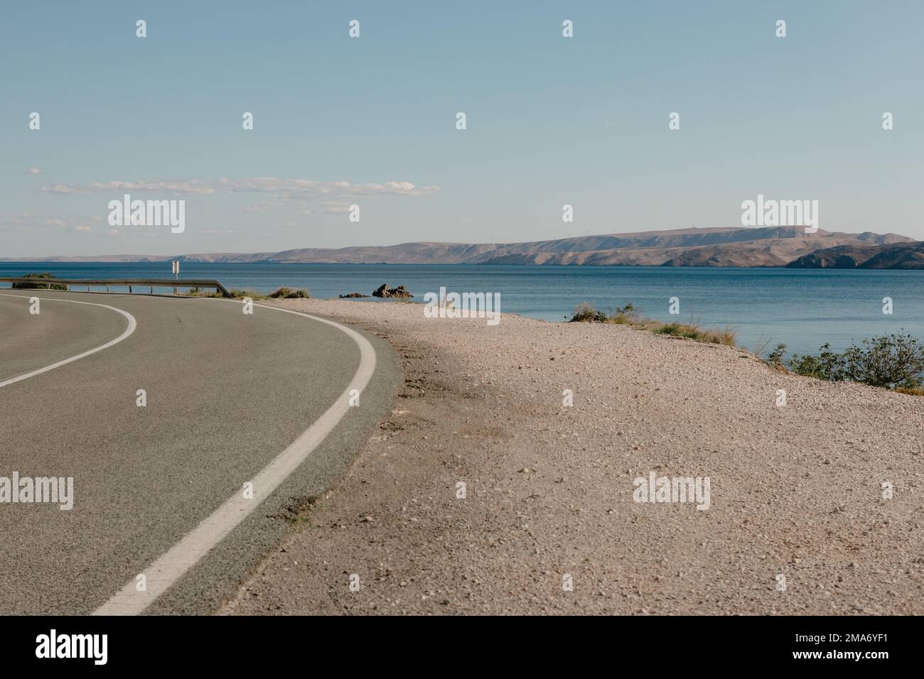 Road in the middle of on island with a breathtaking view Stock Photo ...