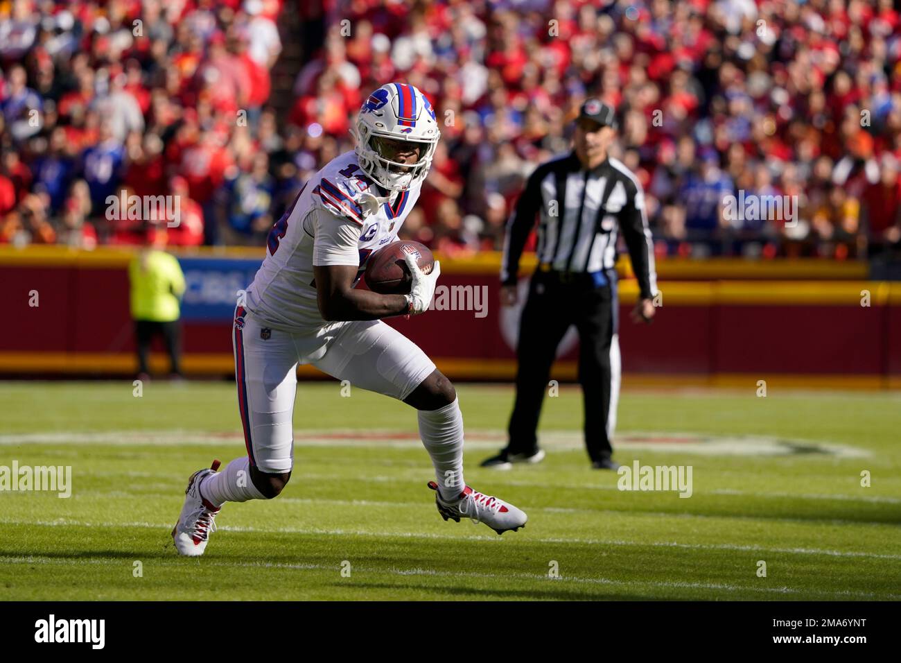 Buffalo Bills wide receiver Stefon Diggs runs with the ball during the first half of an NFL ...