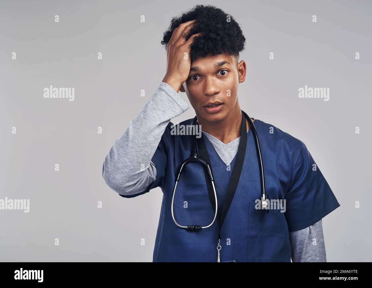Stressed ethnic nurse hi-res stock photography and images - Alamy