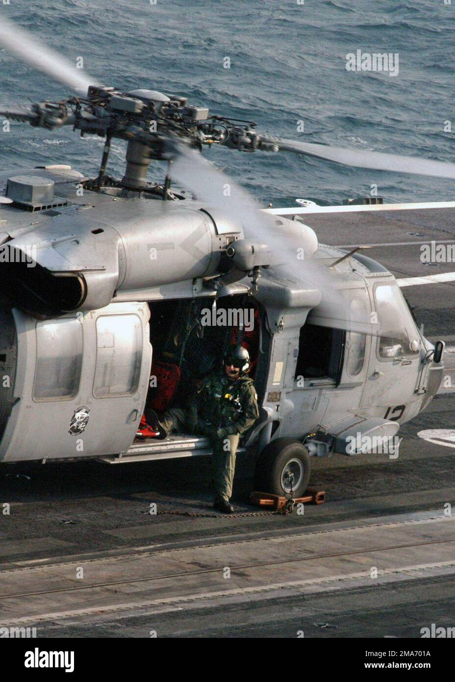 A US Navy (USN) Aviation Warfare SPECIALIST assigned to Helicopter Sea ...