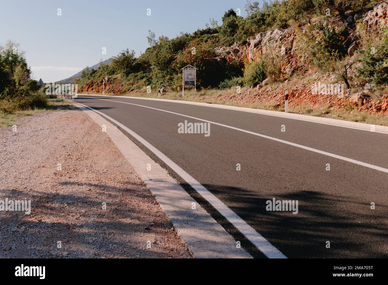 Road in the middle of on island with a breathtaking view Stock Photo ...