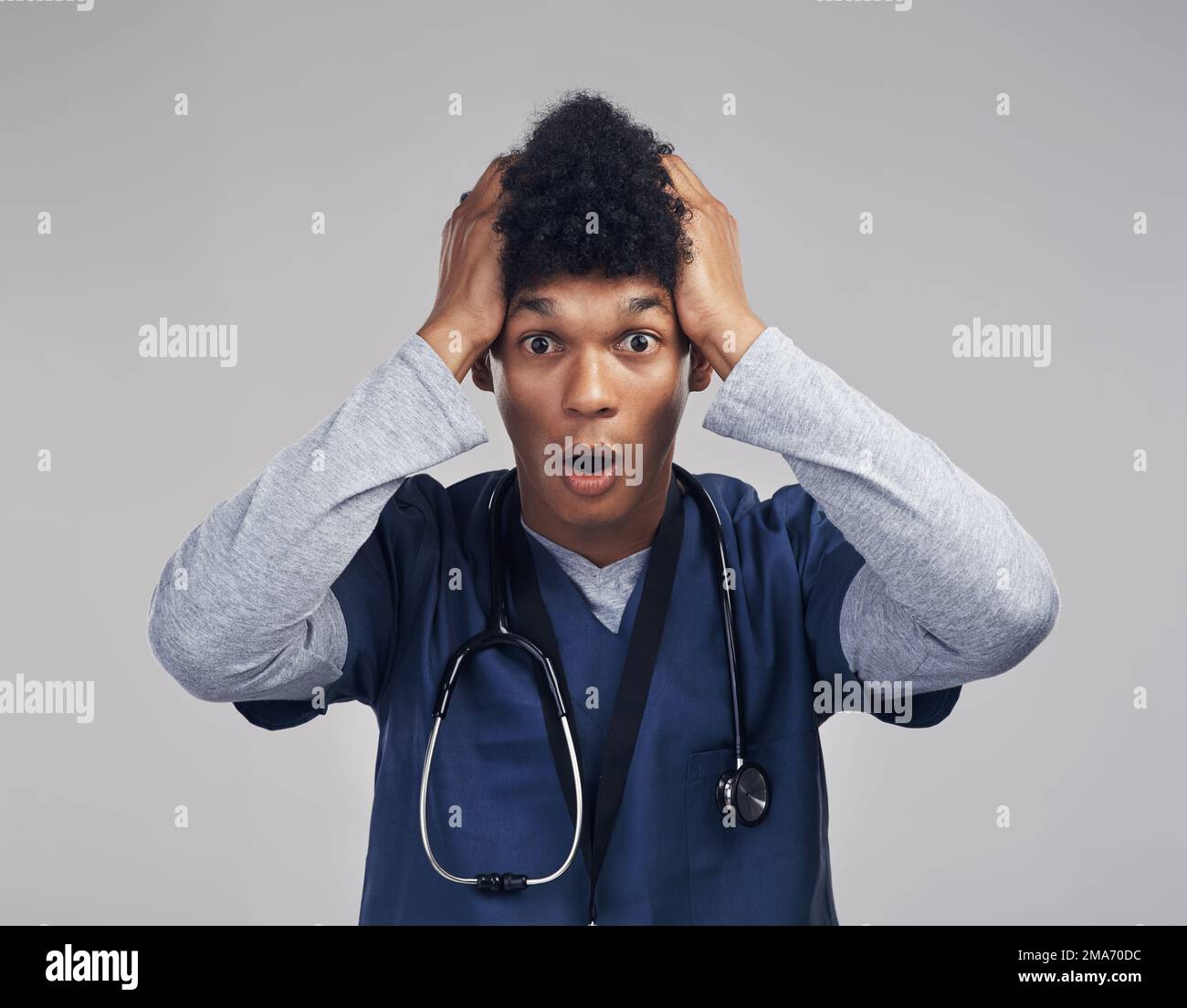 I witness miracles quite often. a male nurse looking astonished while ...