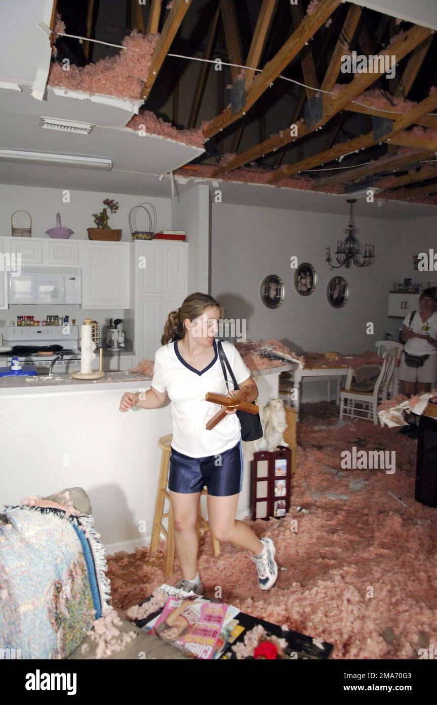 US Air Force (USAF) STAFF Sergeant (SSGT) Susan Tennant examines the ...