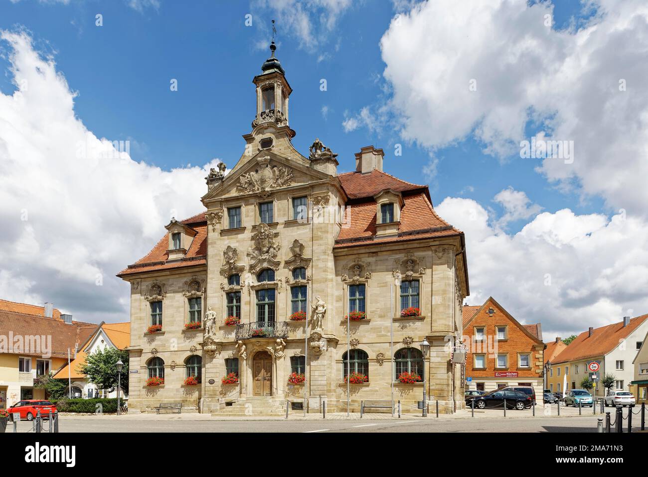 Town hall with rich facade decoration, two-storey mansard roof building ...