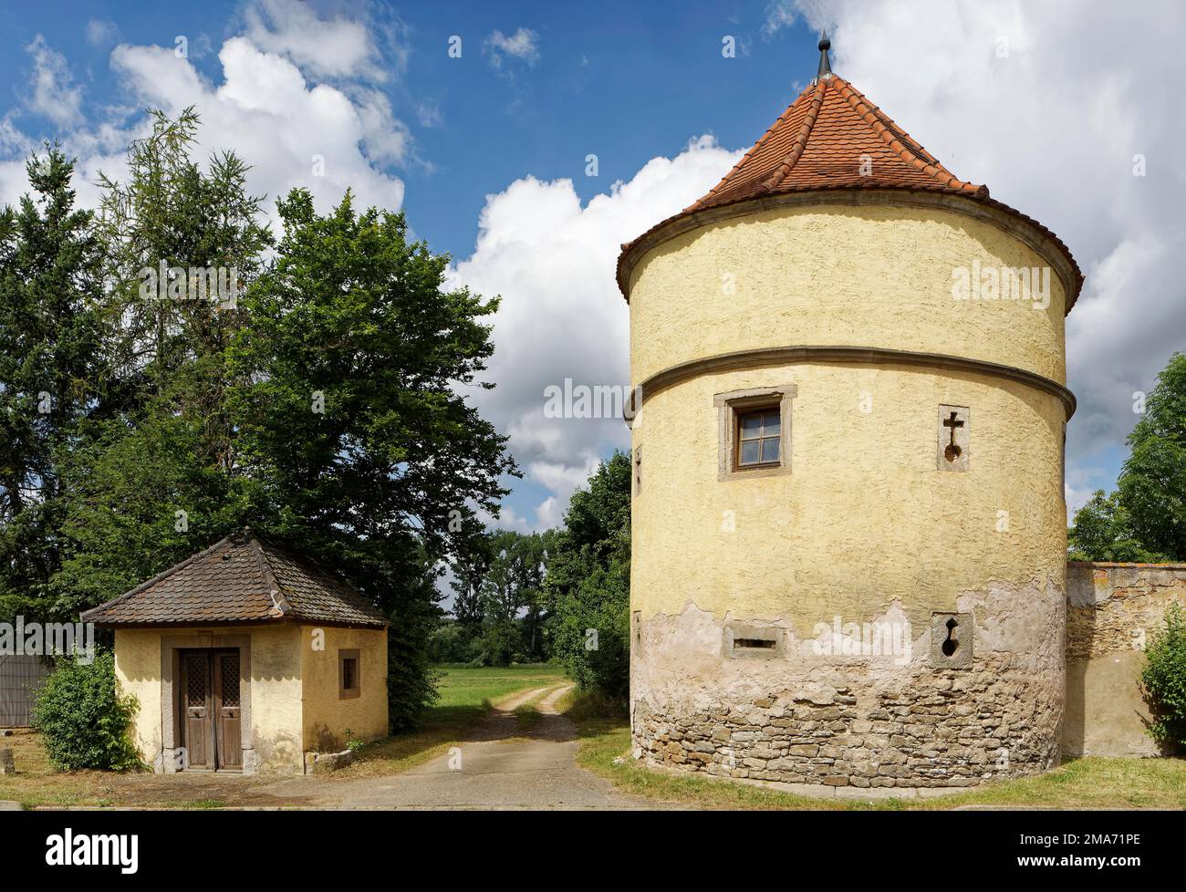 Round defence tower, fortified tower at the former court garden as an ...