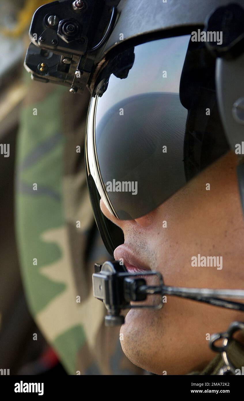 US Army (USA) SPECIALIST (SPC) Timothy Houston, a UH-60L Black Hawk ...