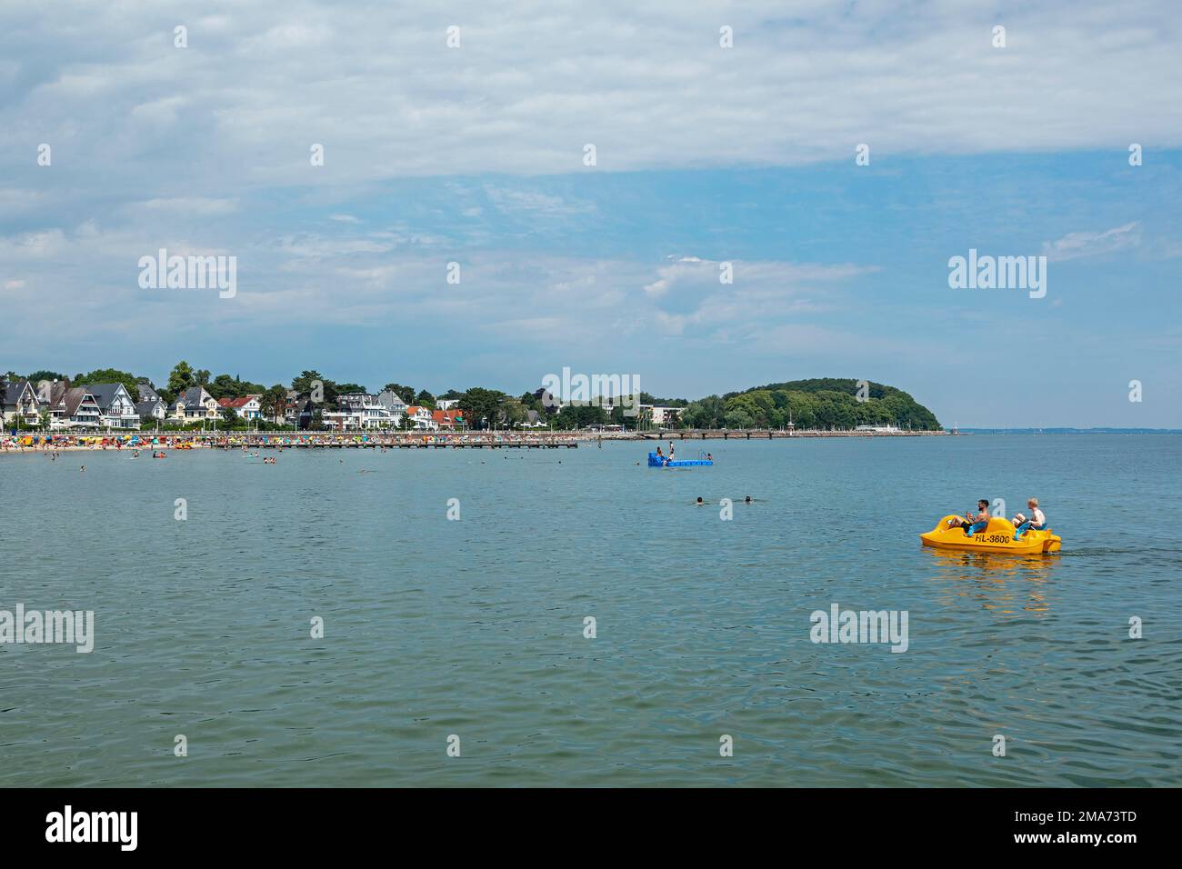 Beach, pedal boat, houses on the shore, Travemuende, Luebeck, Schleswig ...