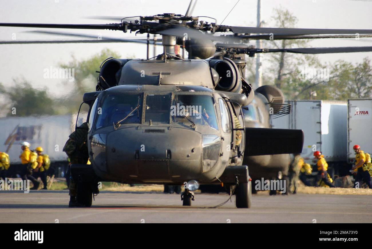 A US Army (USA) UH-60 Black Hawk (Blackhawk) helicopter prepares to ...