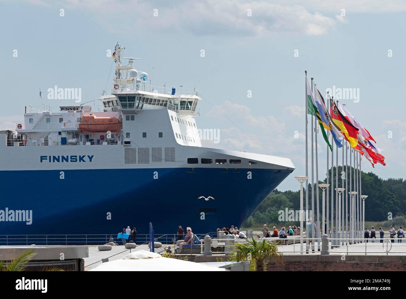 Finnlines ferry, flags, harbour entrance, Travemuende, Luebeck ...