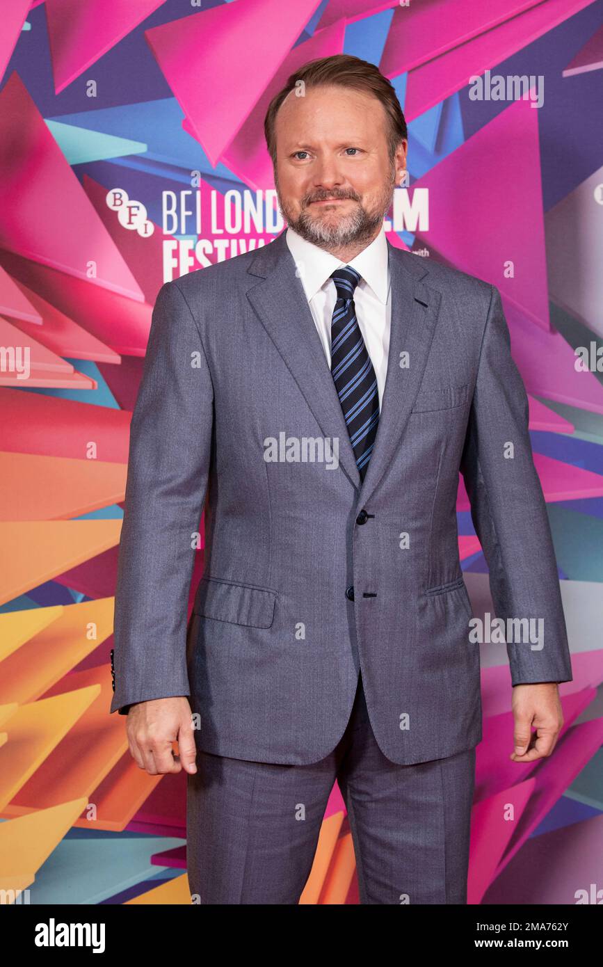 Director Rian Johnson poses for photographers upon arrival at the photo ...