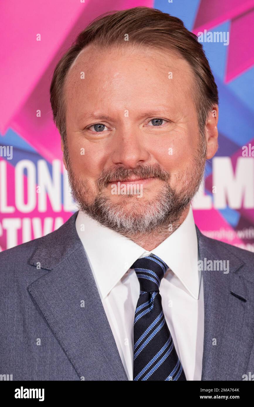 Director Rian Johnson poses for photographers upon arrival at the photo ...
