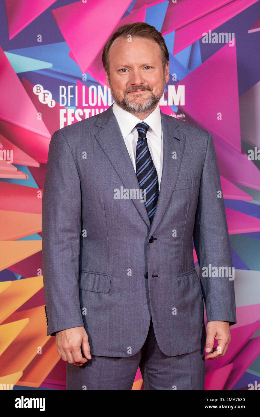 Director Rian Johnson poses for photographers upon arrival at the photo ...