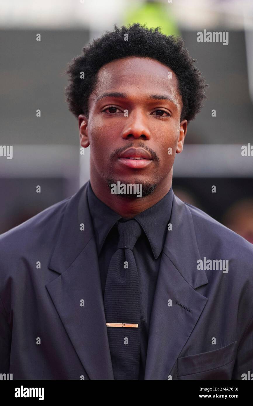 Tosin Cole poses for photographers upon arrival for the premiere of the ...