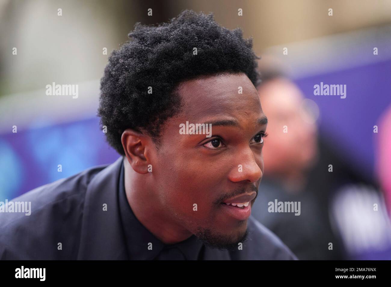 Tosin Cole poses for photographers upon arrival for the premiere of the ...