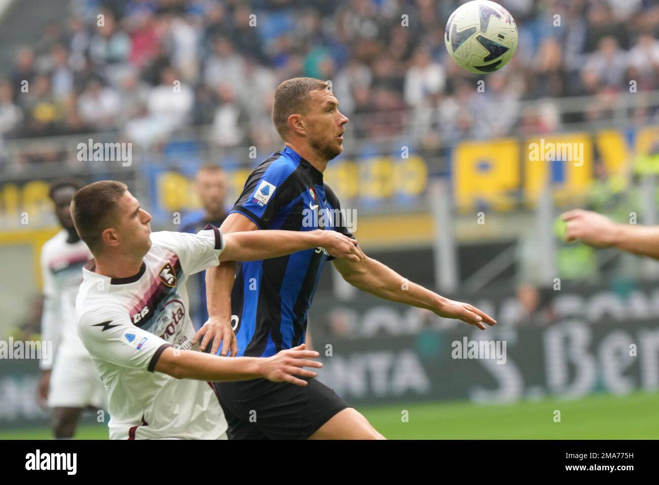 Inter Milan's Edin Dzeko challenges for the ball with Salernitana's ...
