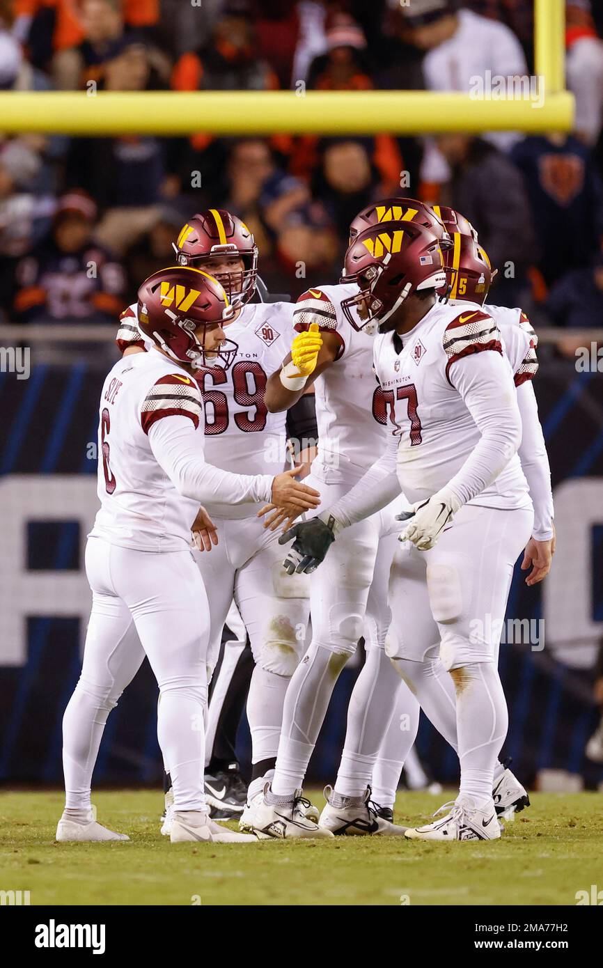 Washington Commanders kicker Joey Slye (6) celebrates with teammates ...